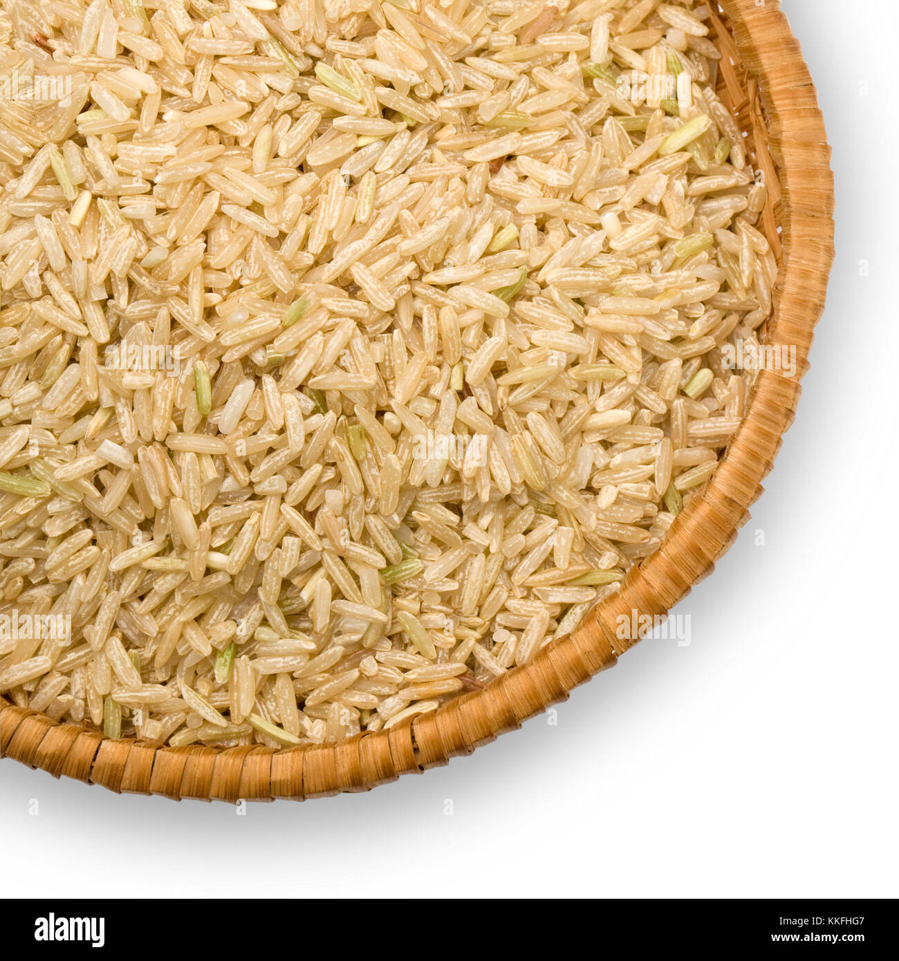 straw plate with brown rice in Thai on a white background Stock Photo ...