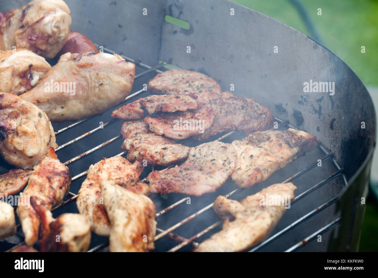 barbecue with delicious grilled meat on grill Stock Photo - Alamy