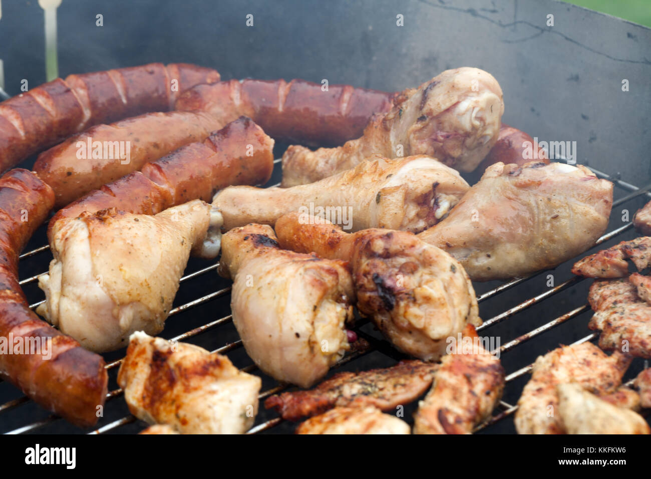 barbecue with delicious grilled meat on grill Stock Photo - Alamy