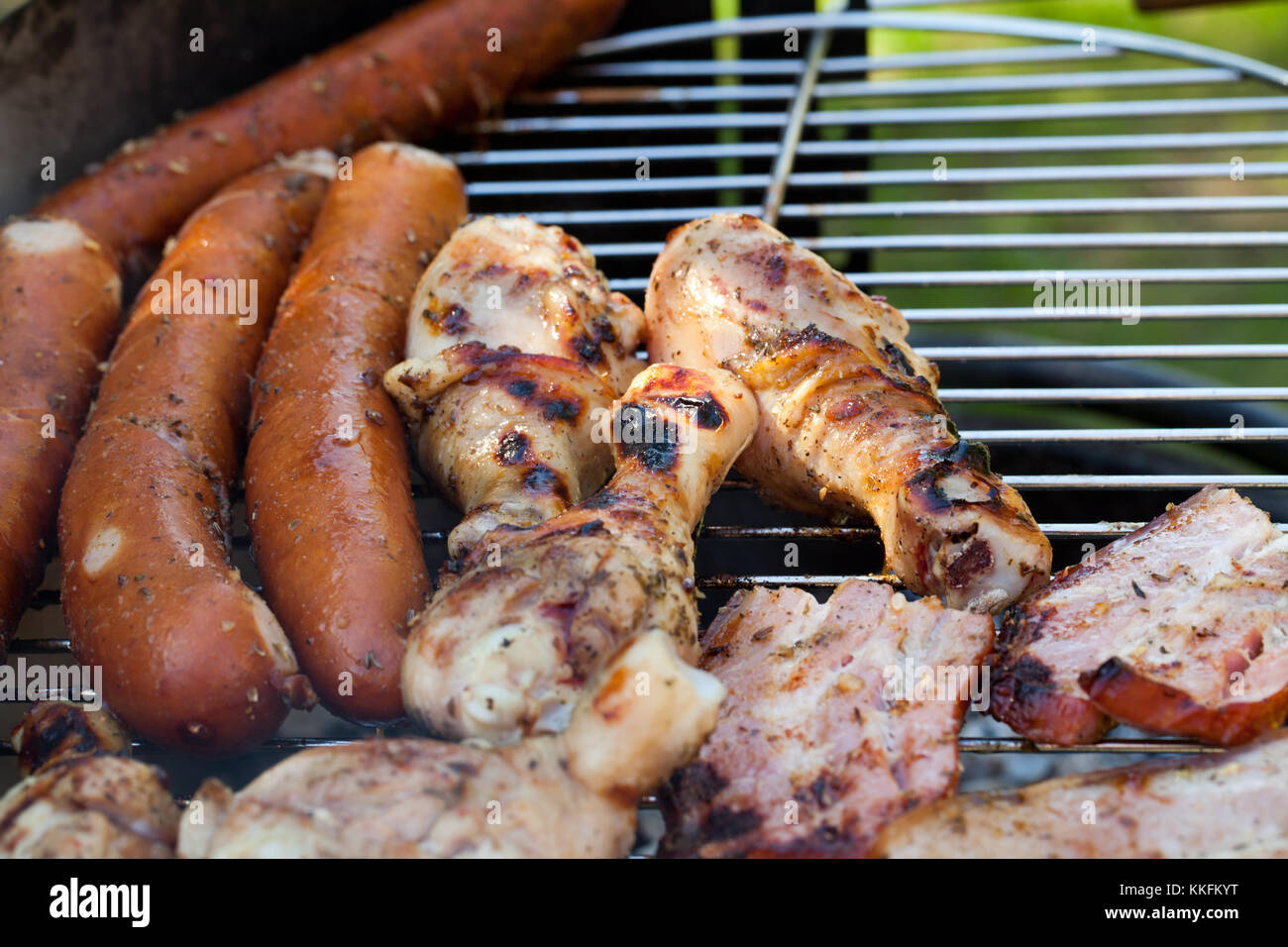 barbecue with delicious grilled meat on grill Stock Photo - Alamy