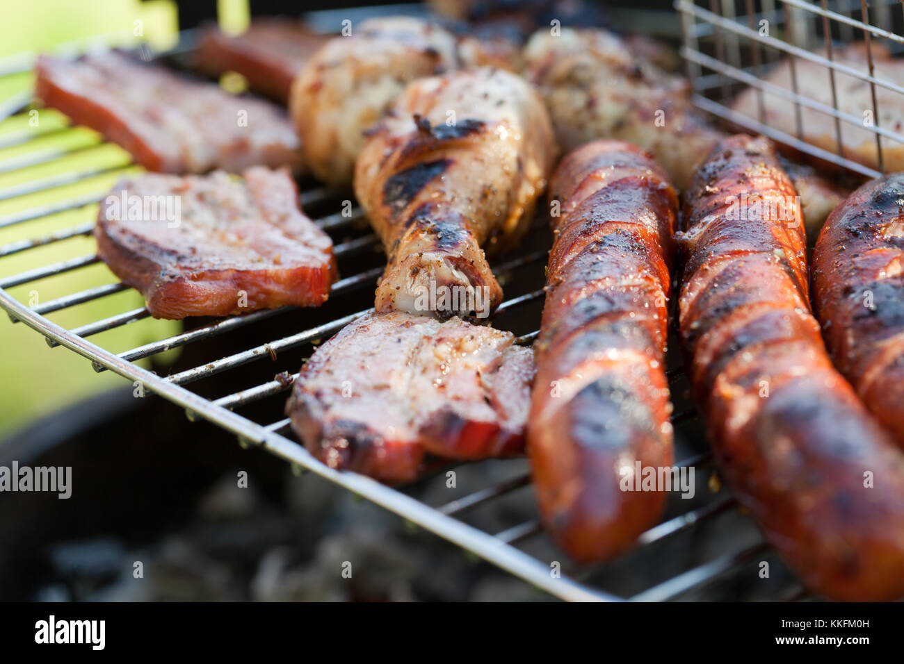 barbecue with delicious grilled meat on grill Stock Photo - Alamy