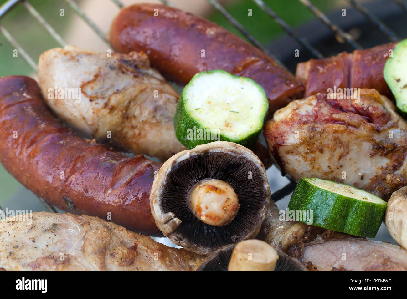 barbecue with delicious grilled meat on grill Stock Photo - Alamy