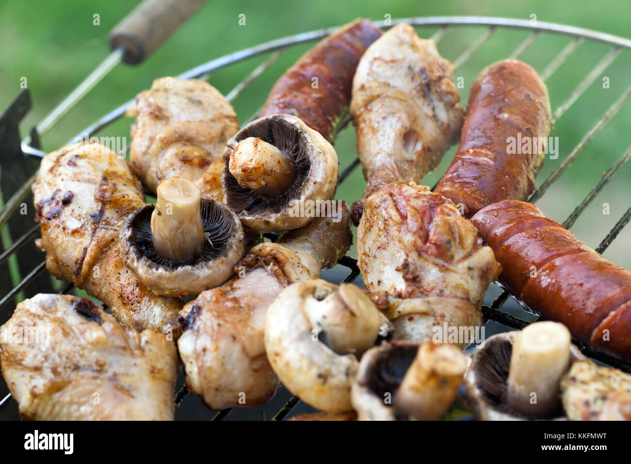 barbecue with delicious grilled meat on grill Stock Photo - Alamy