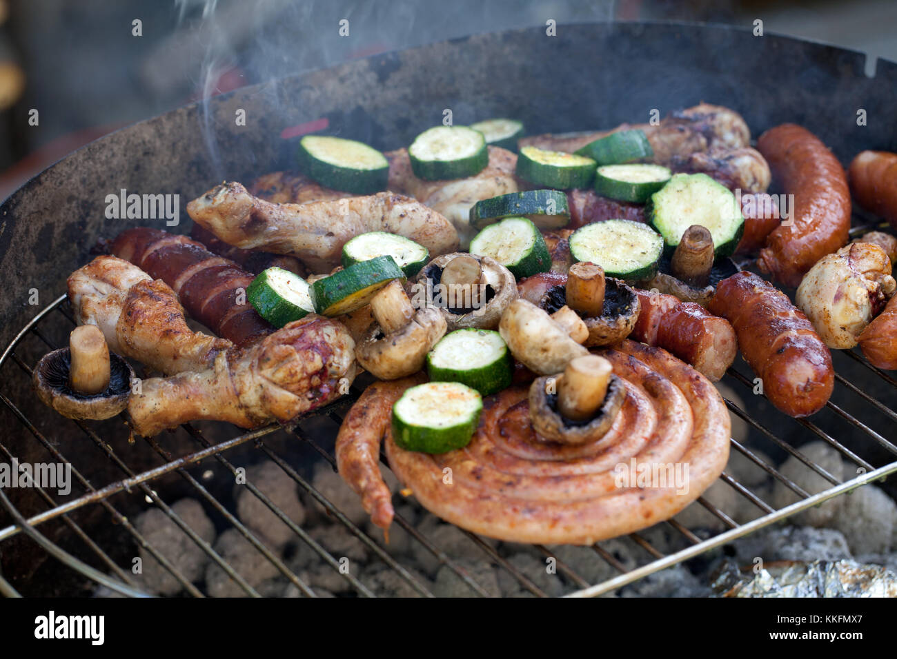 barbecue with delicious grilled meat on grill Stock Photo - Alamy