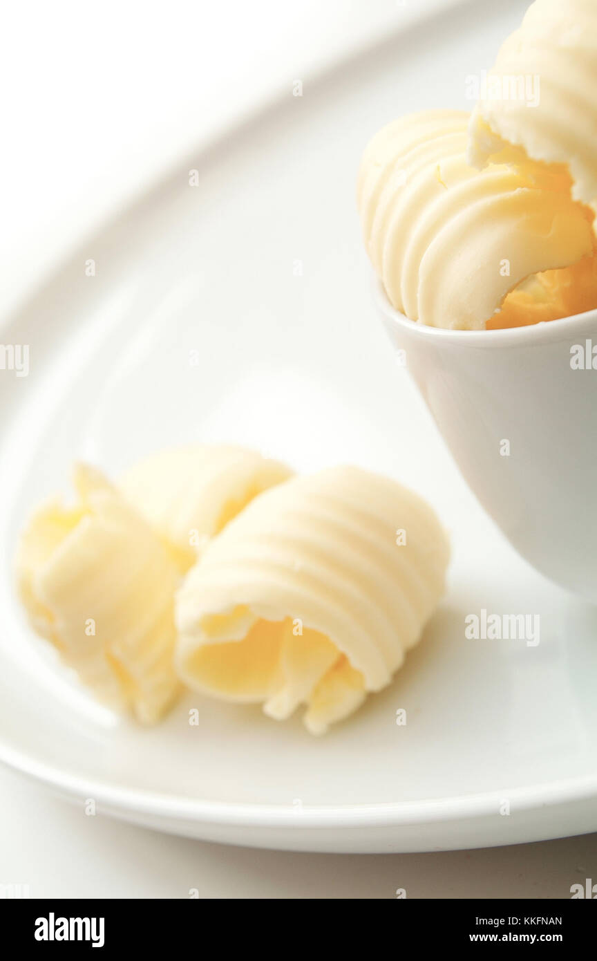 Fresh Butter Curls In Dish Stock Photo - Alamy