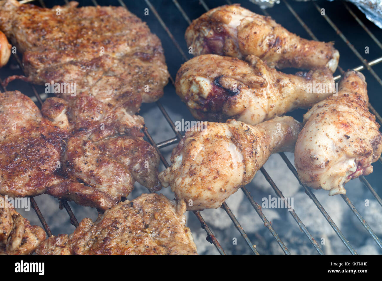 barbecue with delicious grilled meat on grill Stock Photo - Alamy