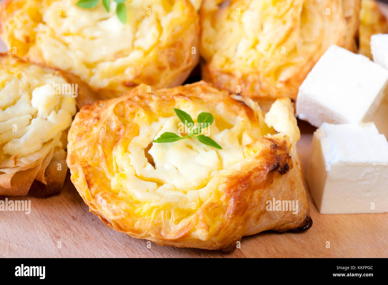 Melted feta cheese on the fresh baked pastry Stock Photo - Alamy