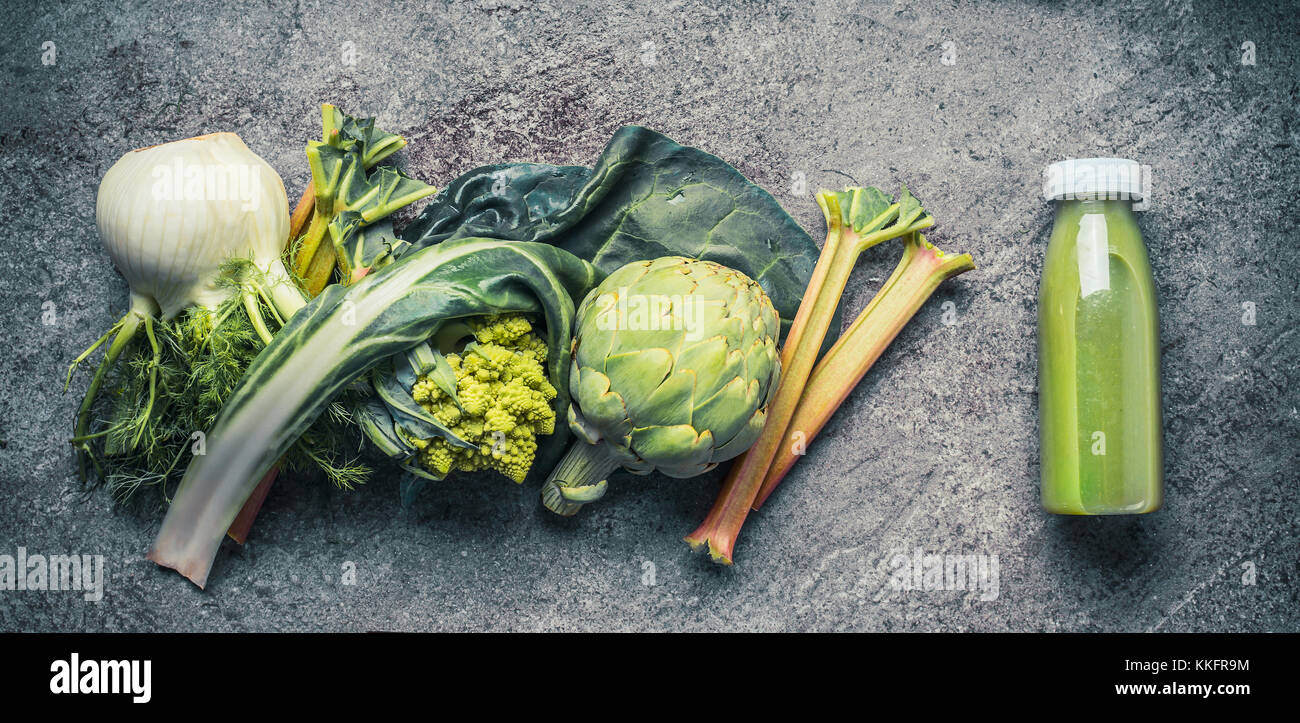 Homemade healthy refreshing vegetables beverage in bottle with ...