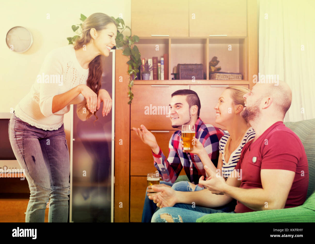 Group of adults having fun at house booze party Stock Photo - Alamy