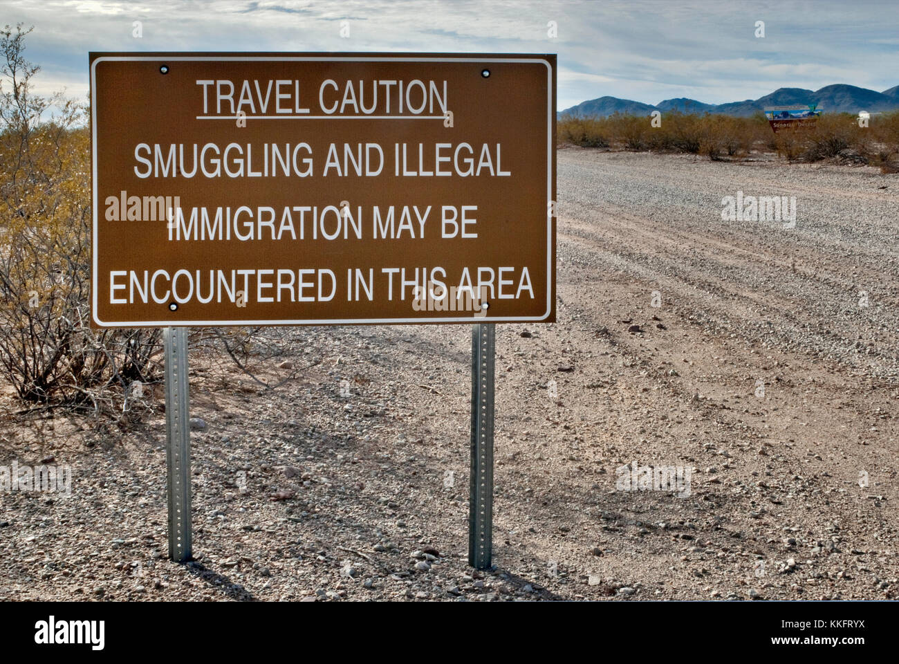 Warning sign in border area at Vekol Valley Road in Sonoran Desert ...
