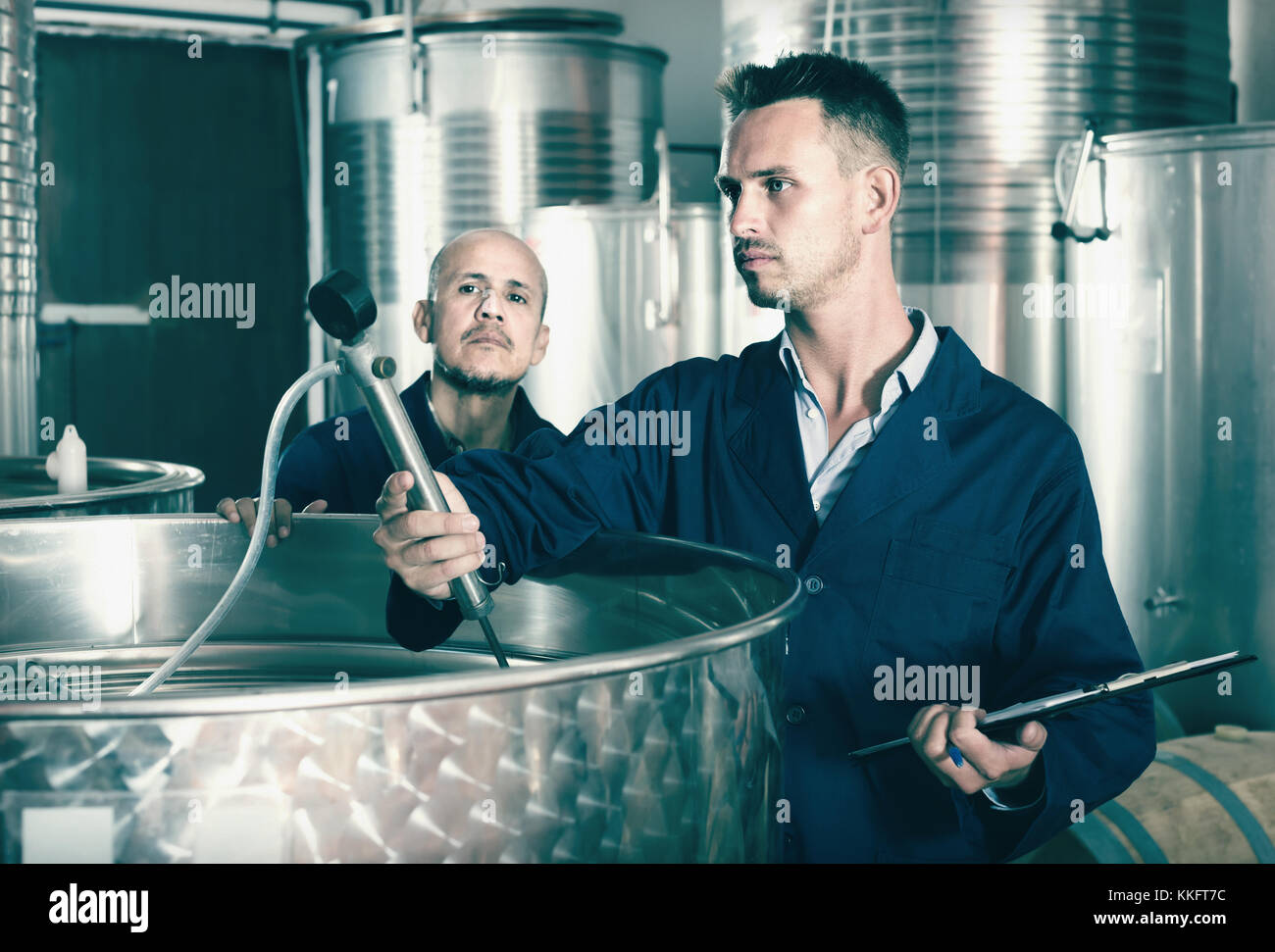 Man taking off coat hi-res stock photography and images - Alamy