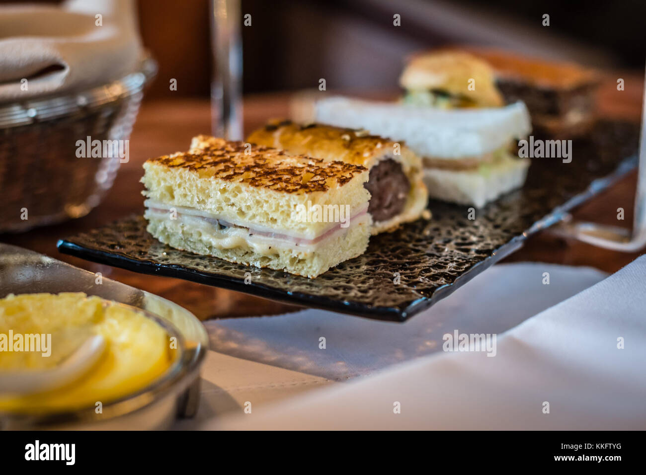 three tier afternoon tea set and pastries Stock Photo - Alamy