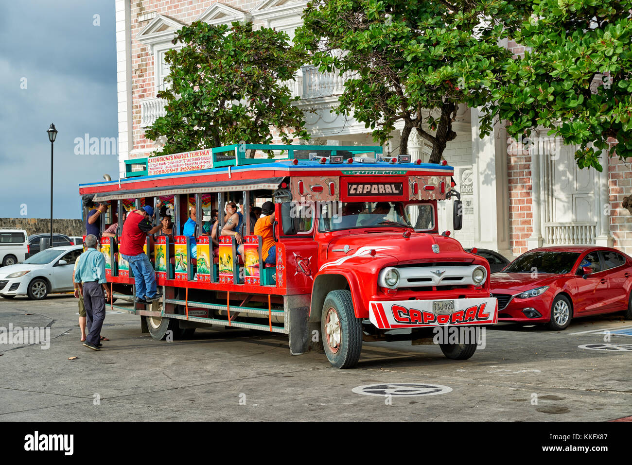 traditional colorful Chiva bus in street of Cartagena de Indias ...