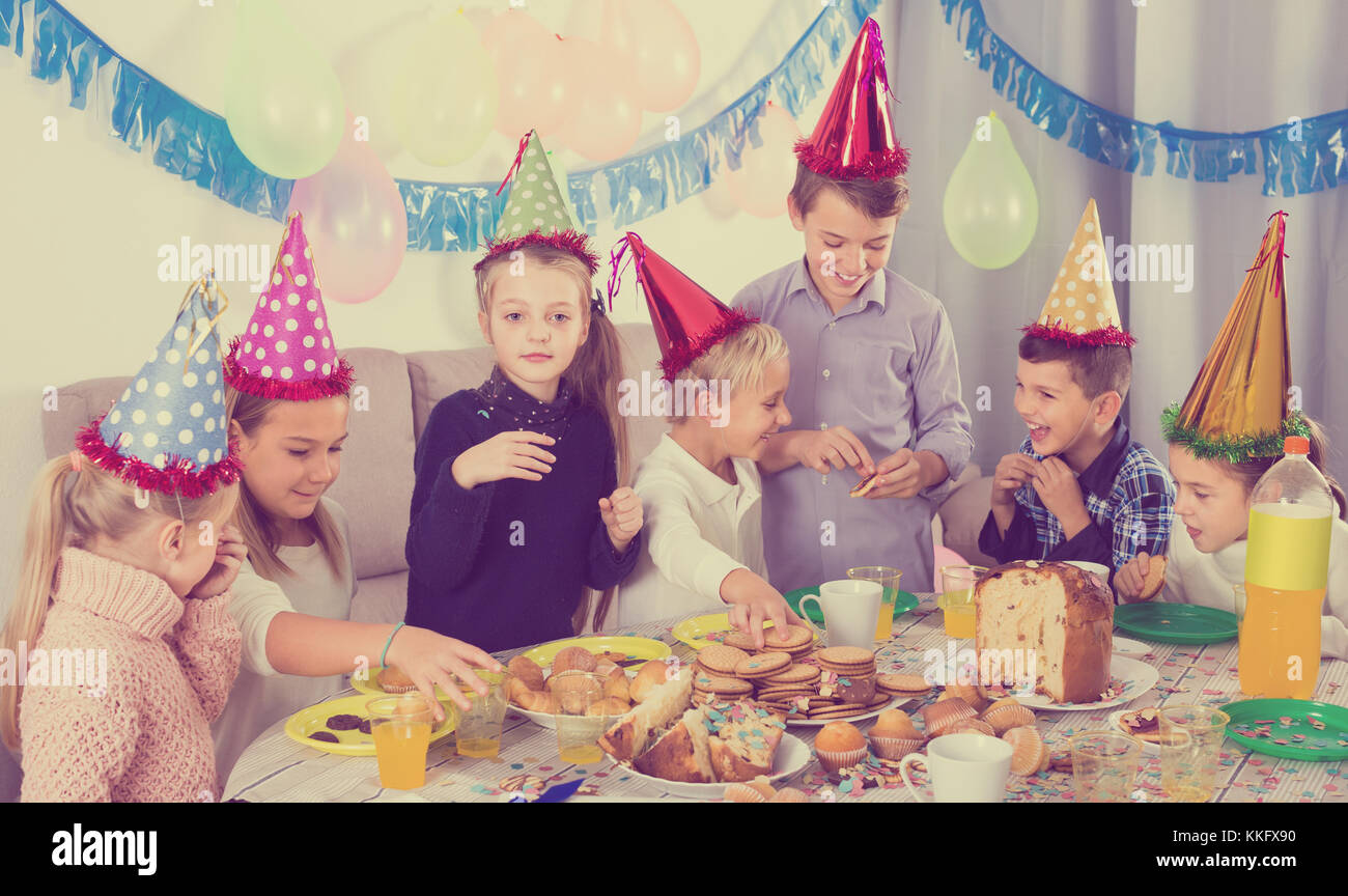 friendly children having good time during friend’s birthday party Stock ...