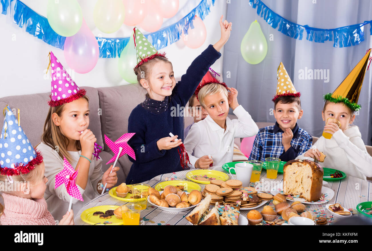 vigorous children having good time during friend’s birthday party Stock ...