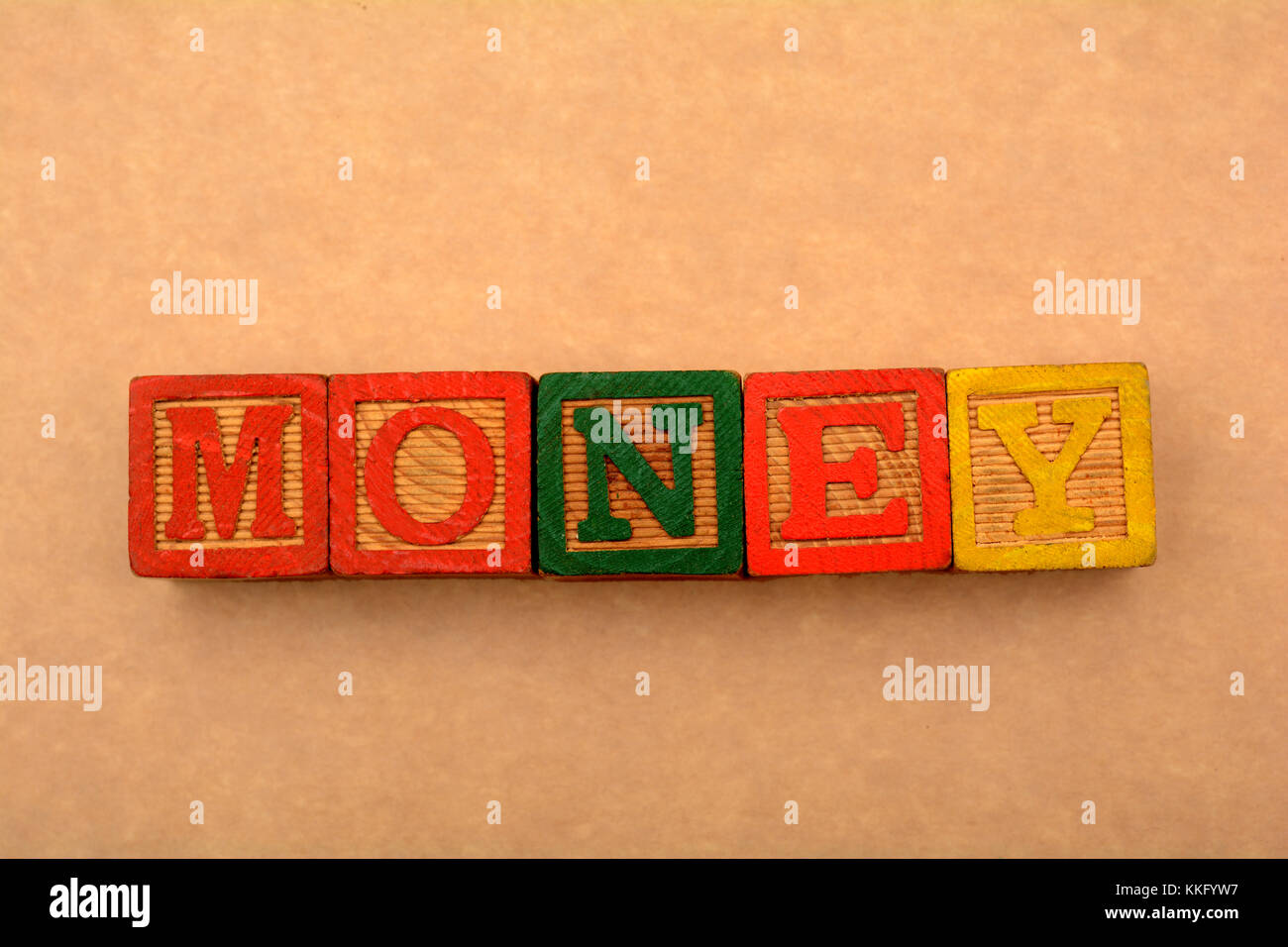 Money Word in Wood Block - Finance concept Stock Photo - Alamy
