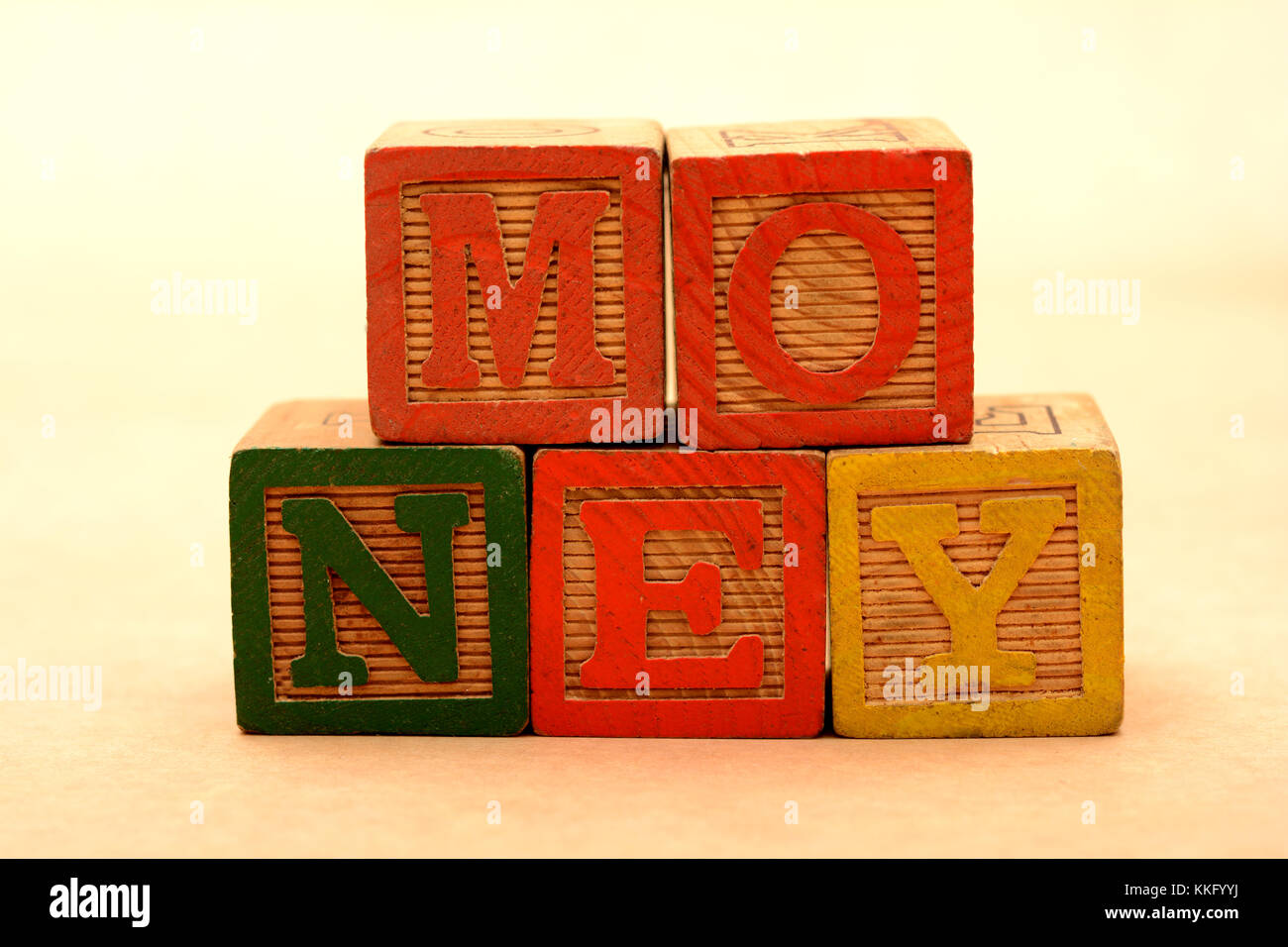 Money Word in Wood Block - Finance concept Stock Photo - Alamy