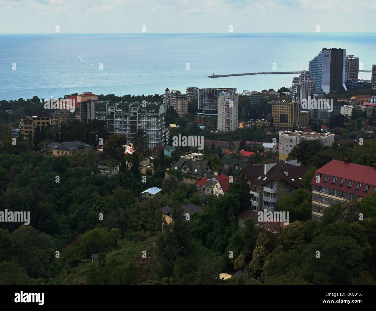 Panorama of Sochi from the air. Houses, streets, trees, the sky are ...