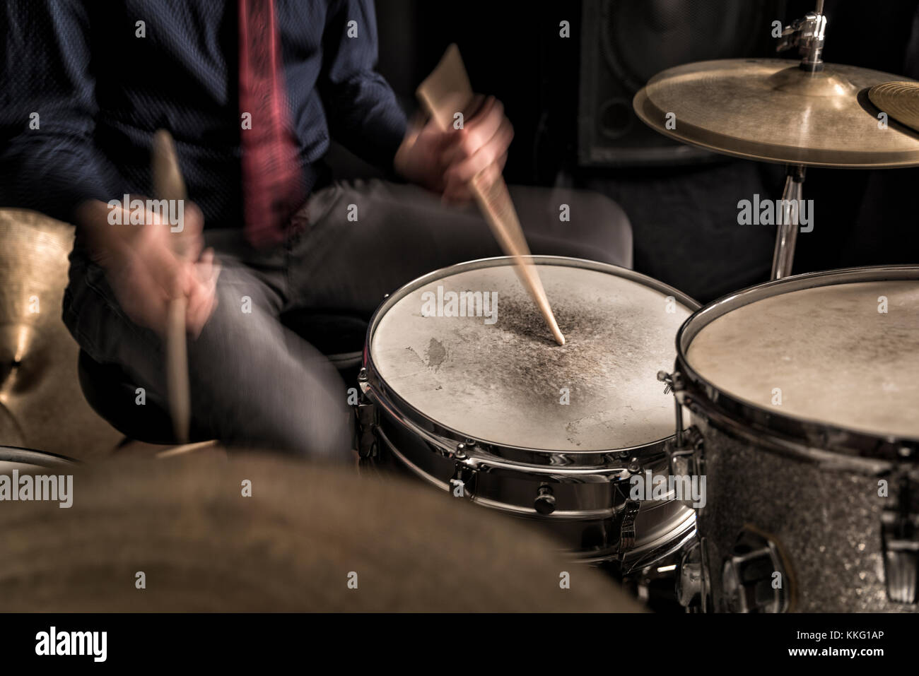 Drummer playing a rhythm, closeup, front view Stock Photo - Alamy
