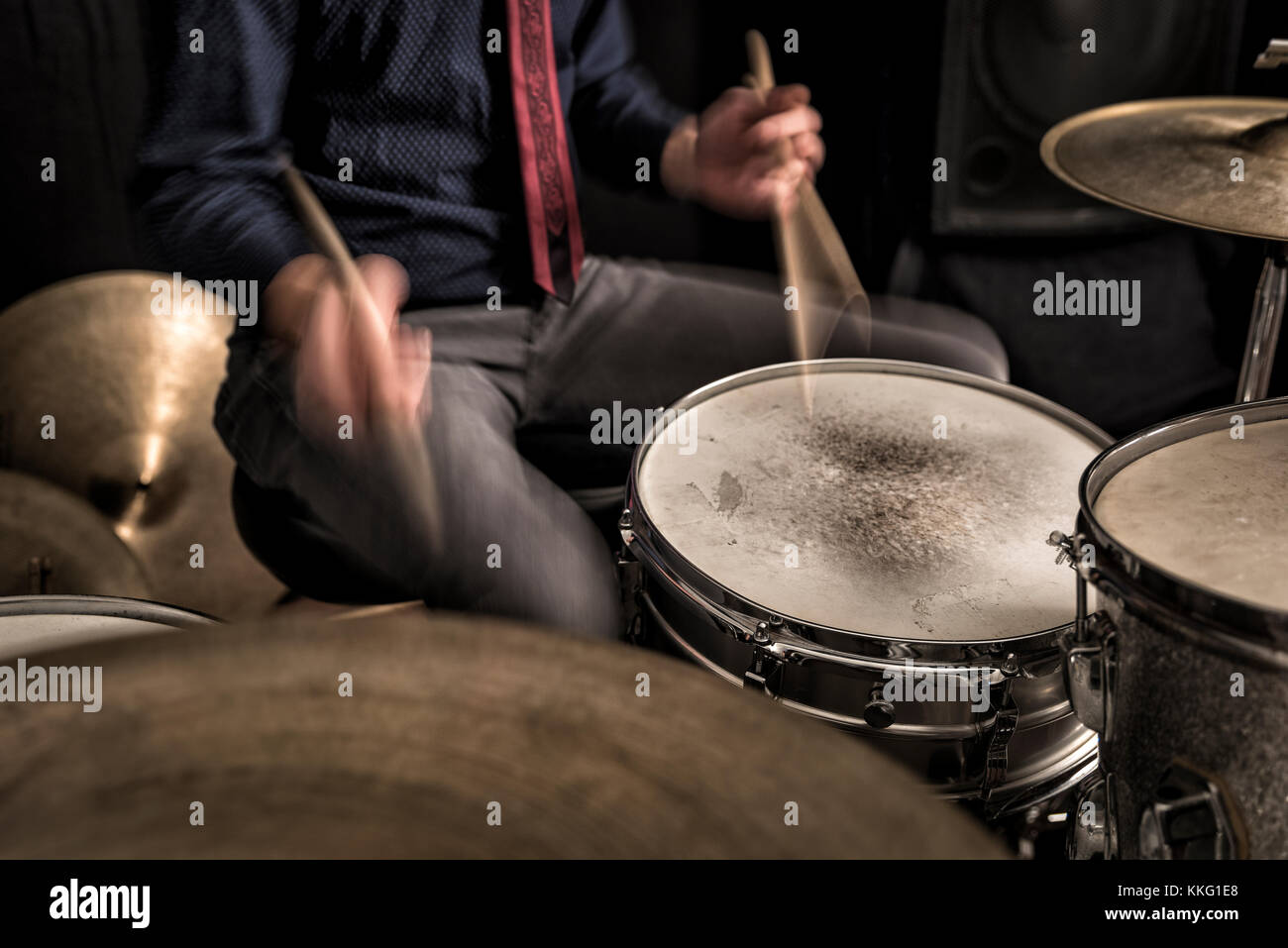 Drummer playing a rhythm, closeup, front view Stock Photo - Alamy