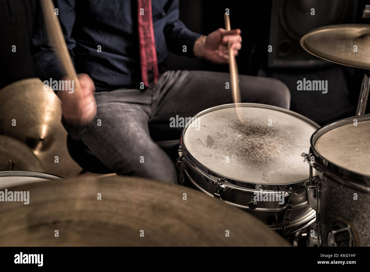 Drummer playing a rhythm, closeup, front view Stock Photo - Alamy