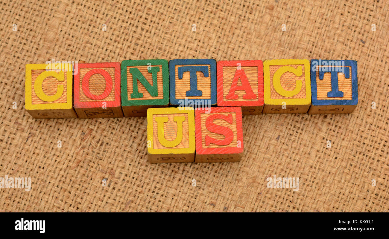 Contact Us Idea on word blocks Customer Service concept Stock Photo - Alamy