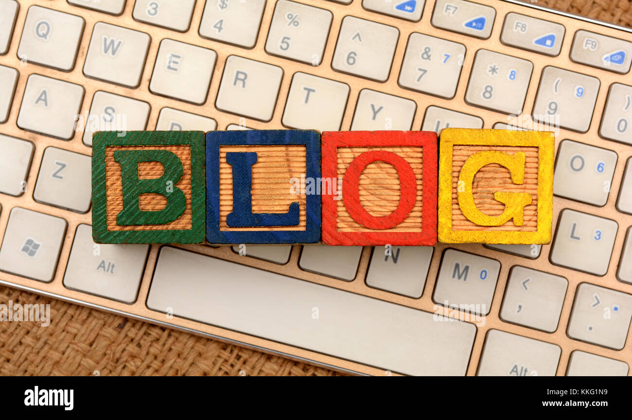 Blog words on laptop keyboard top view Stock Photo - Alamy