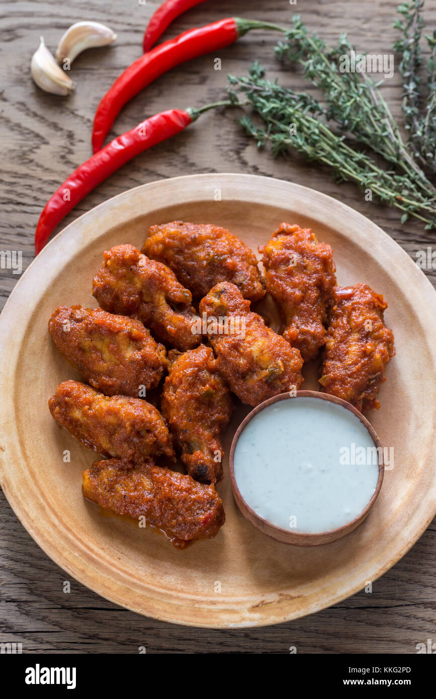 Fried chicken wings with blue cheese sauce Stock Photo - Alamy