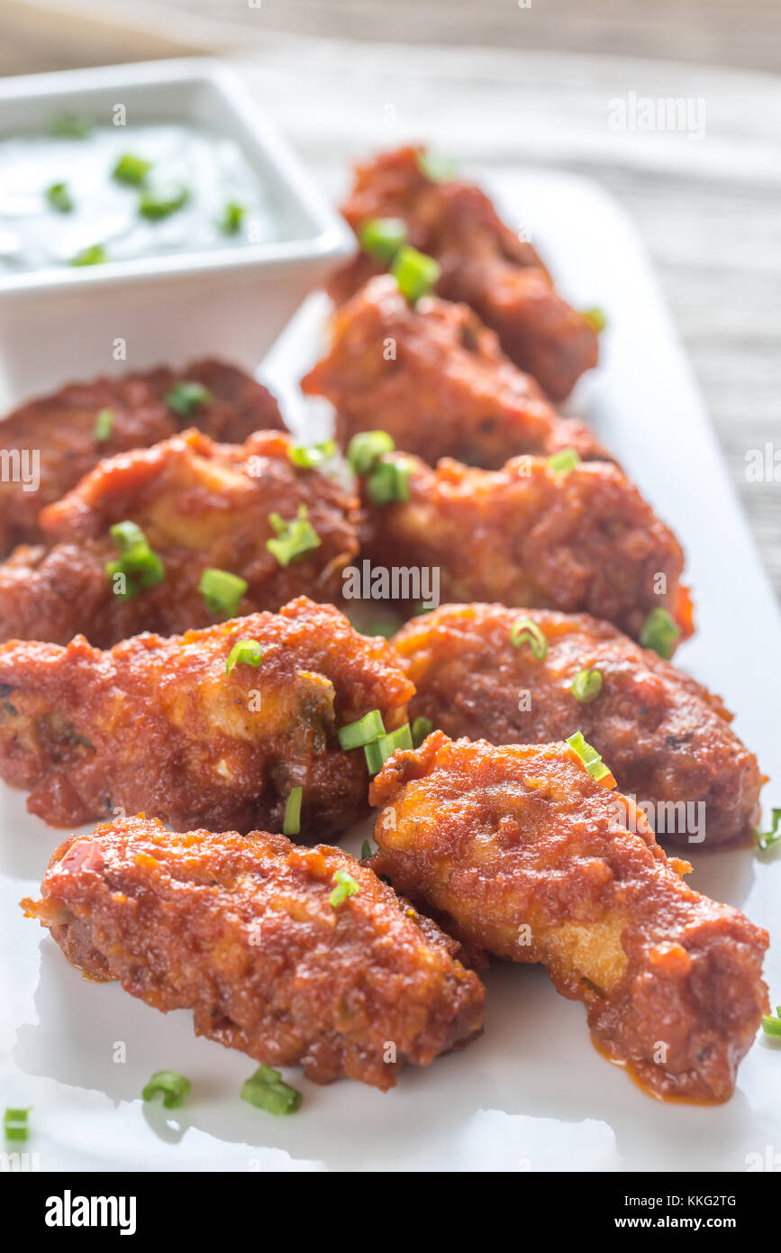 Fried chicken wings with blue cheese sauce Stock Photo - Alamy