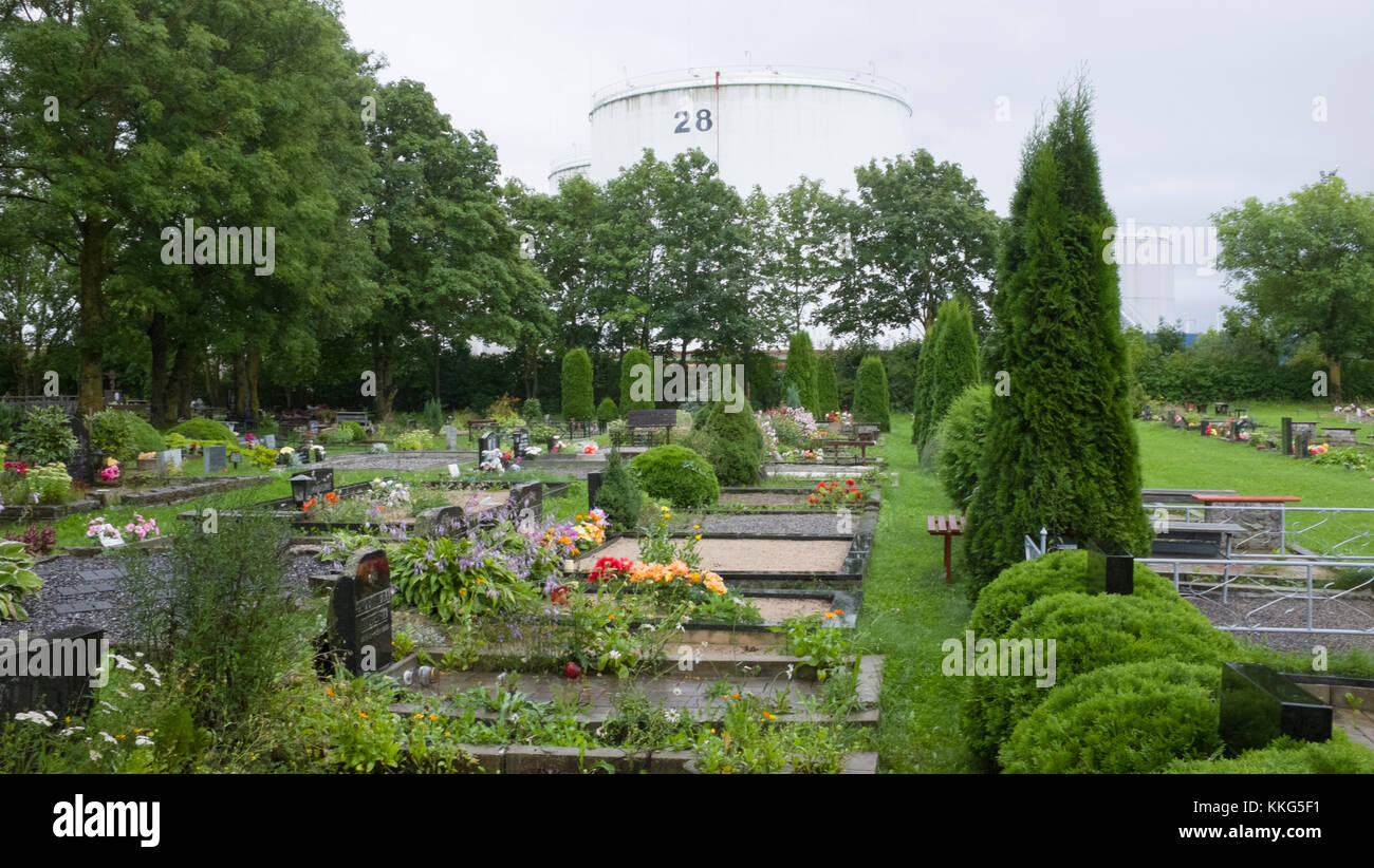 Graveyard near oil tanks, in the former closed town of Paldiski ...