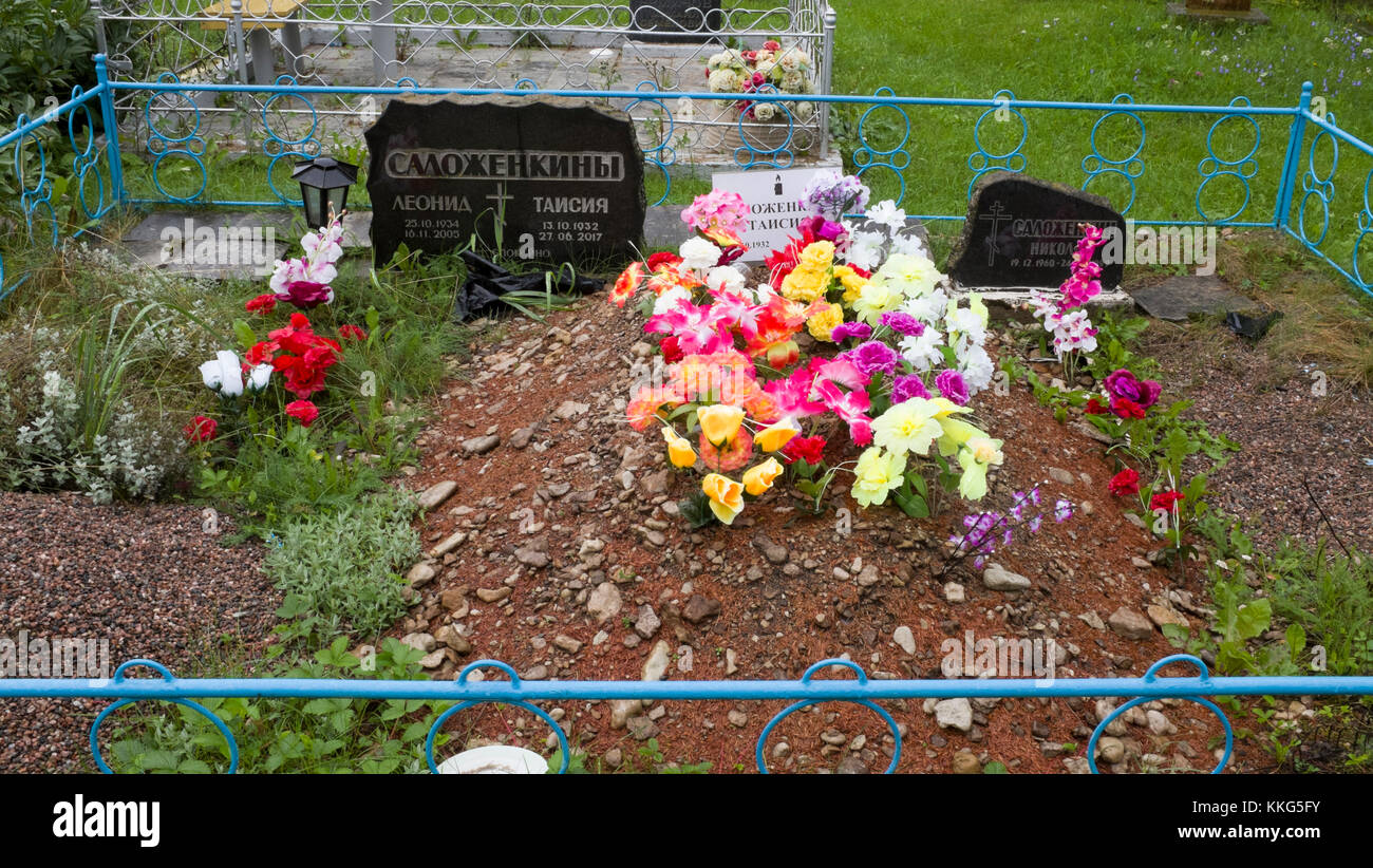 Graveyard near oil tanks, in the former closed town of Paldiski ...