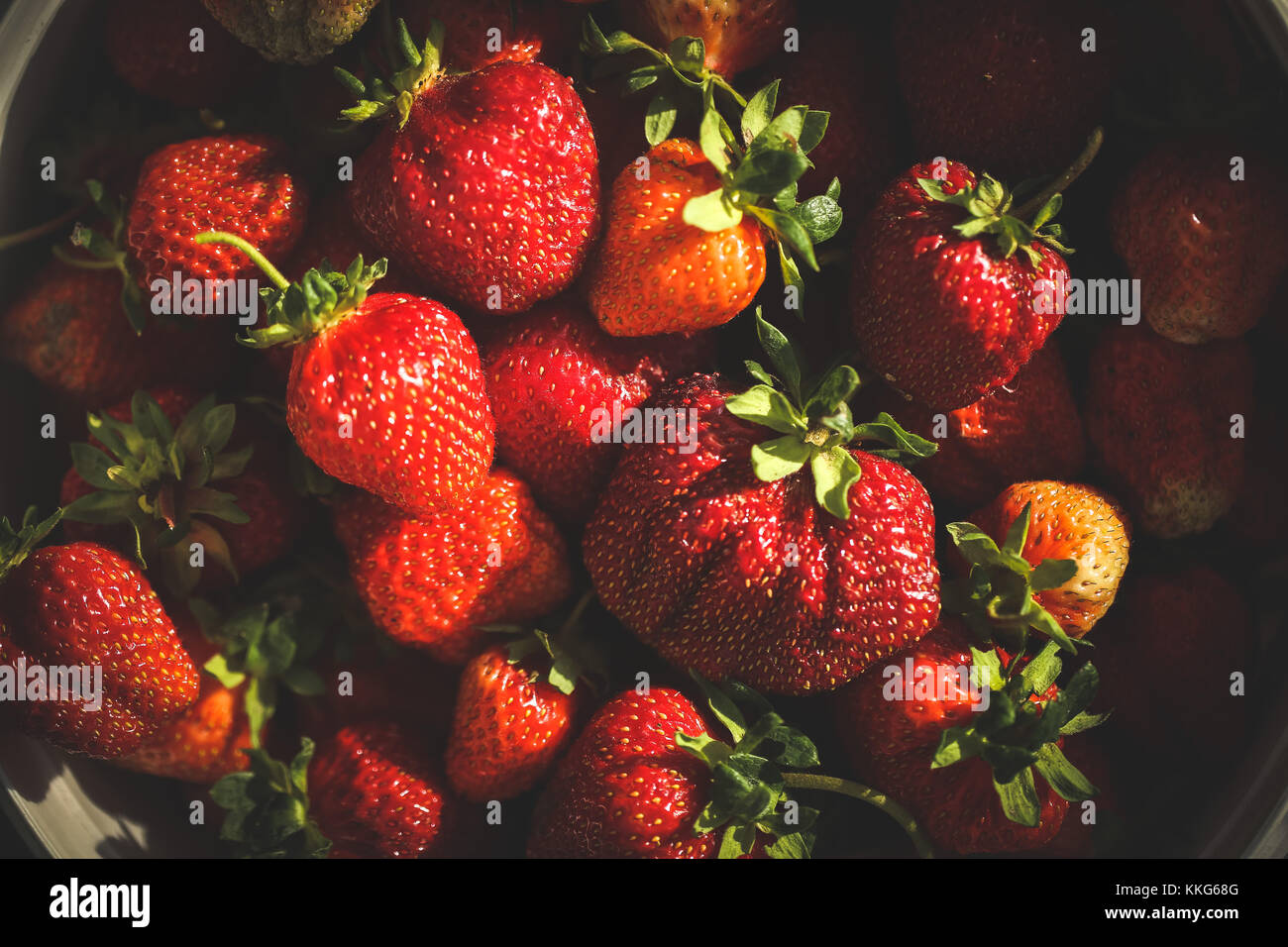 Fresh strawberries bunch. Closeup photo. Macro photography with vintage ...