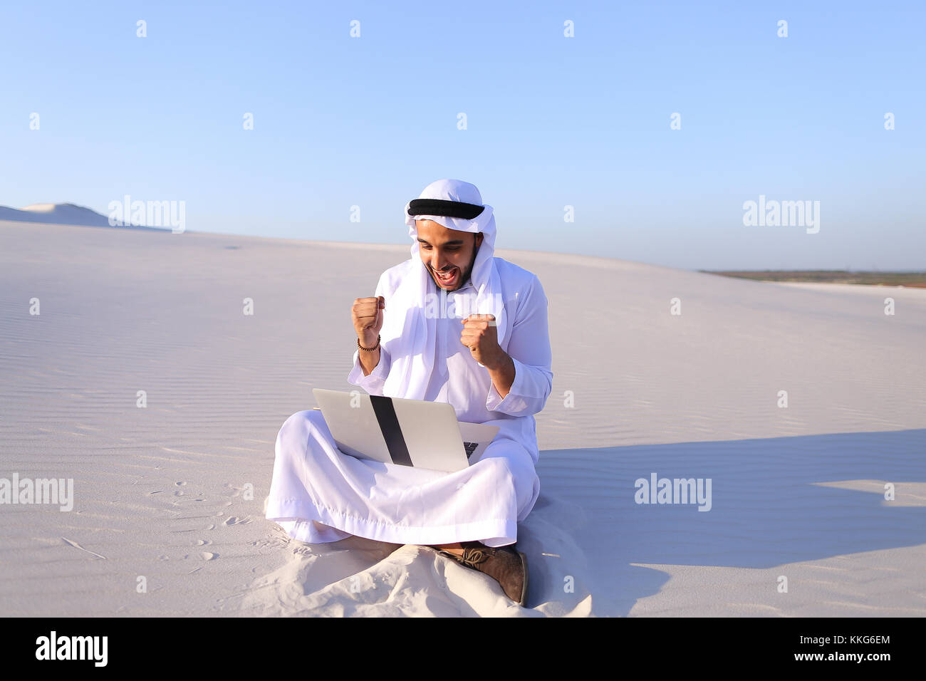 Emirati guy professional designer with computer projects project Stock ...