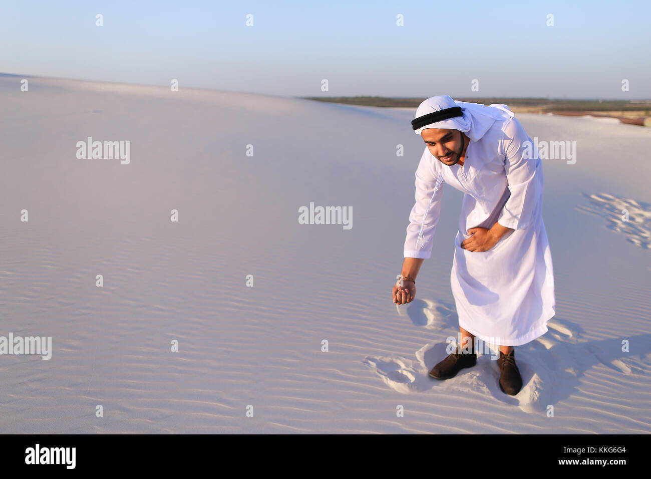 Muslim man develops sand along wind standing in middle of desert Stock ...