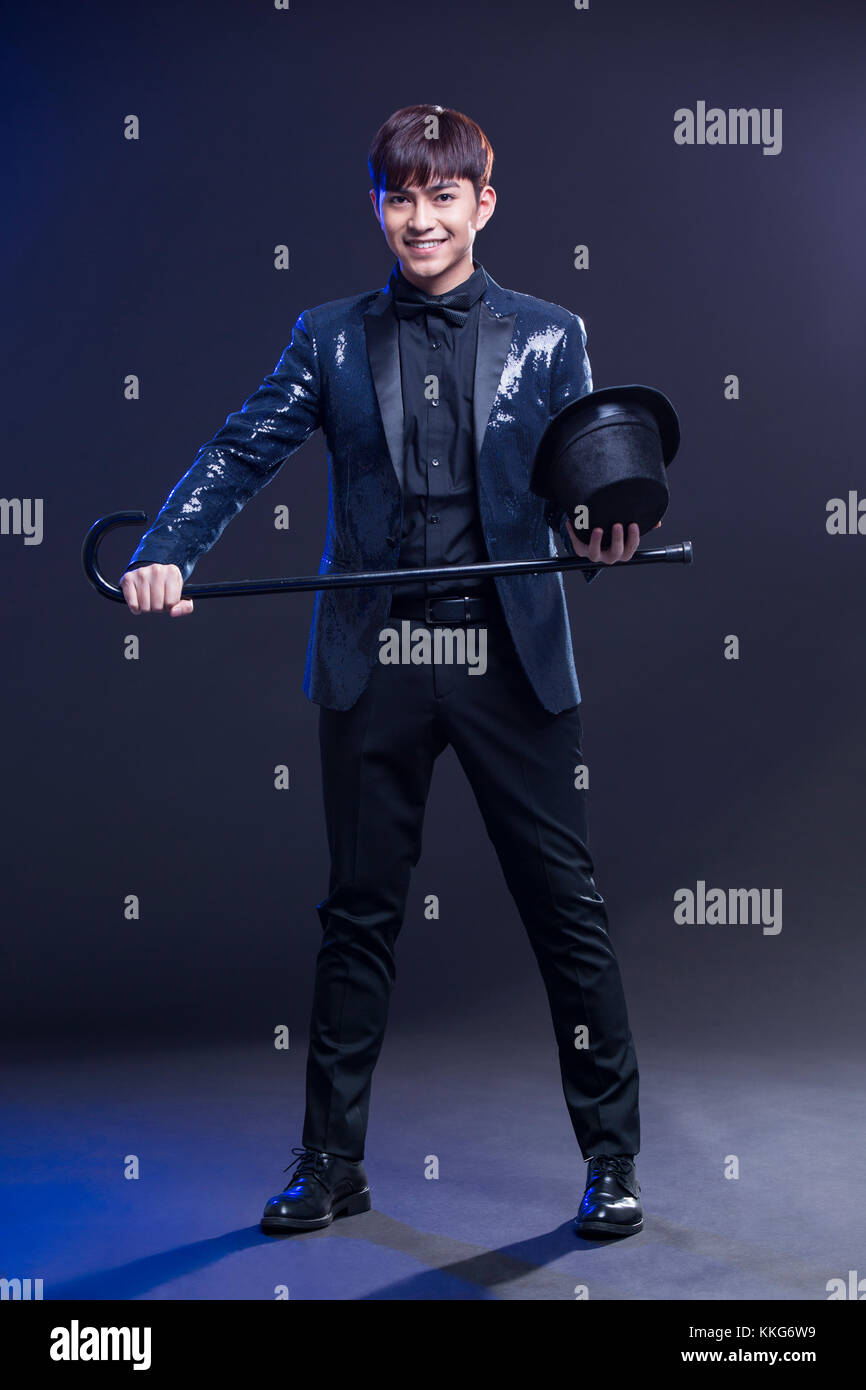 Young Chinese male magician Stock Photo - Alamy