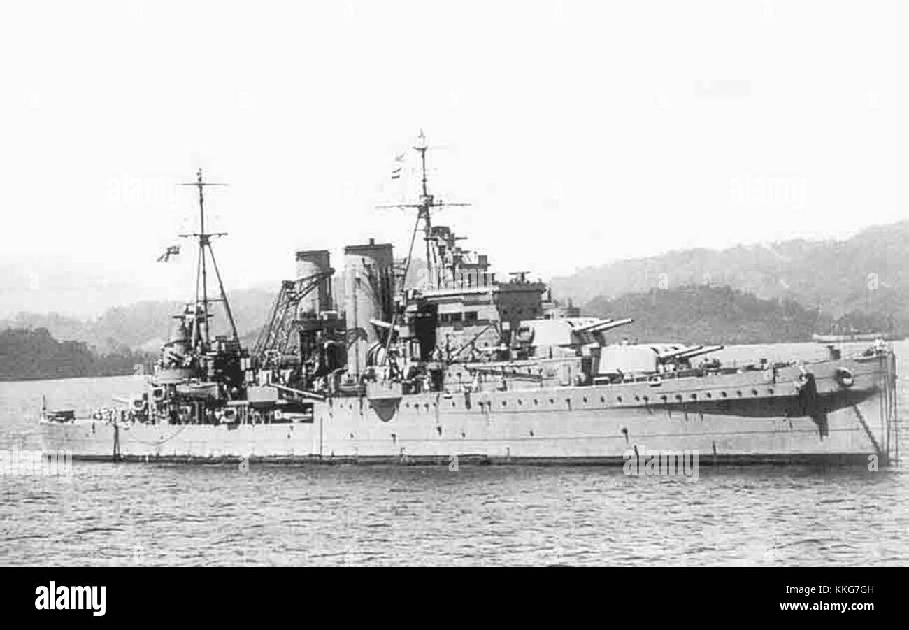 This photograph captures the HMS Exeter, a British Royal Navy ship, in ...