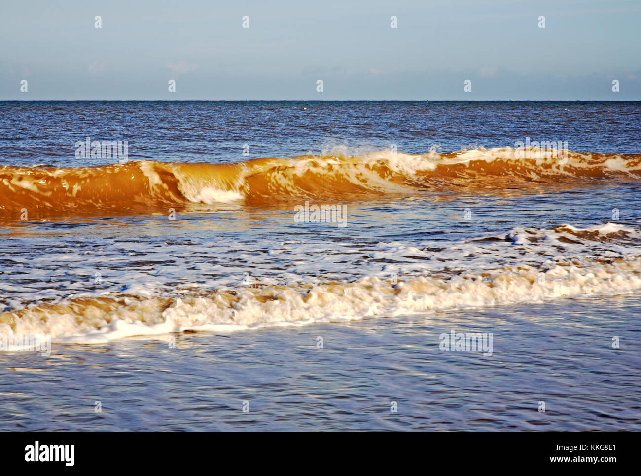 A breaking wave on the North Norfolk coast at East Runton, Norfolk ...
