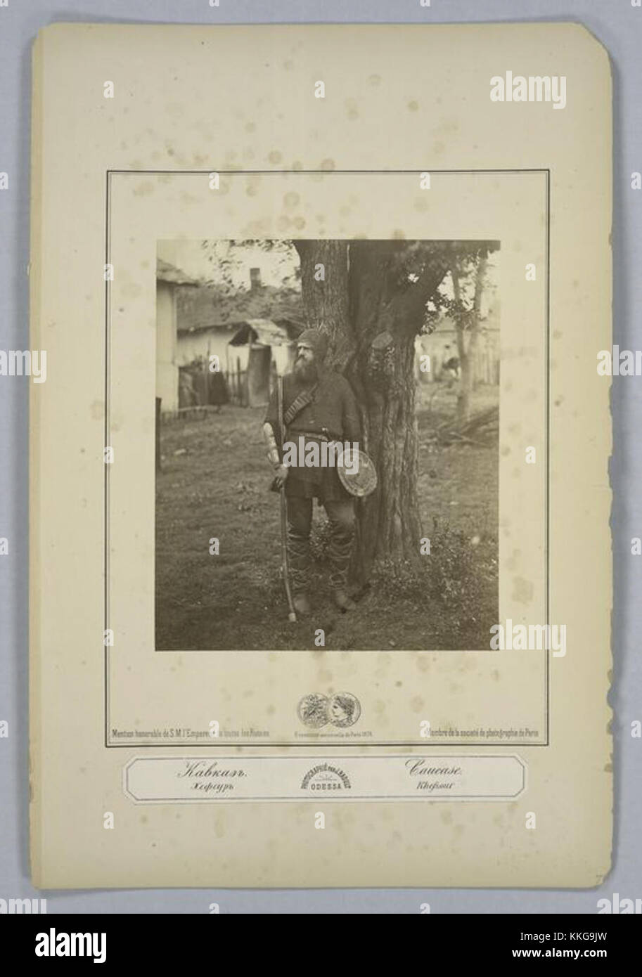 A Khevsur man depicted in traditional armor and shield, representing ...
