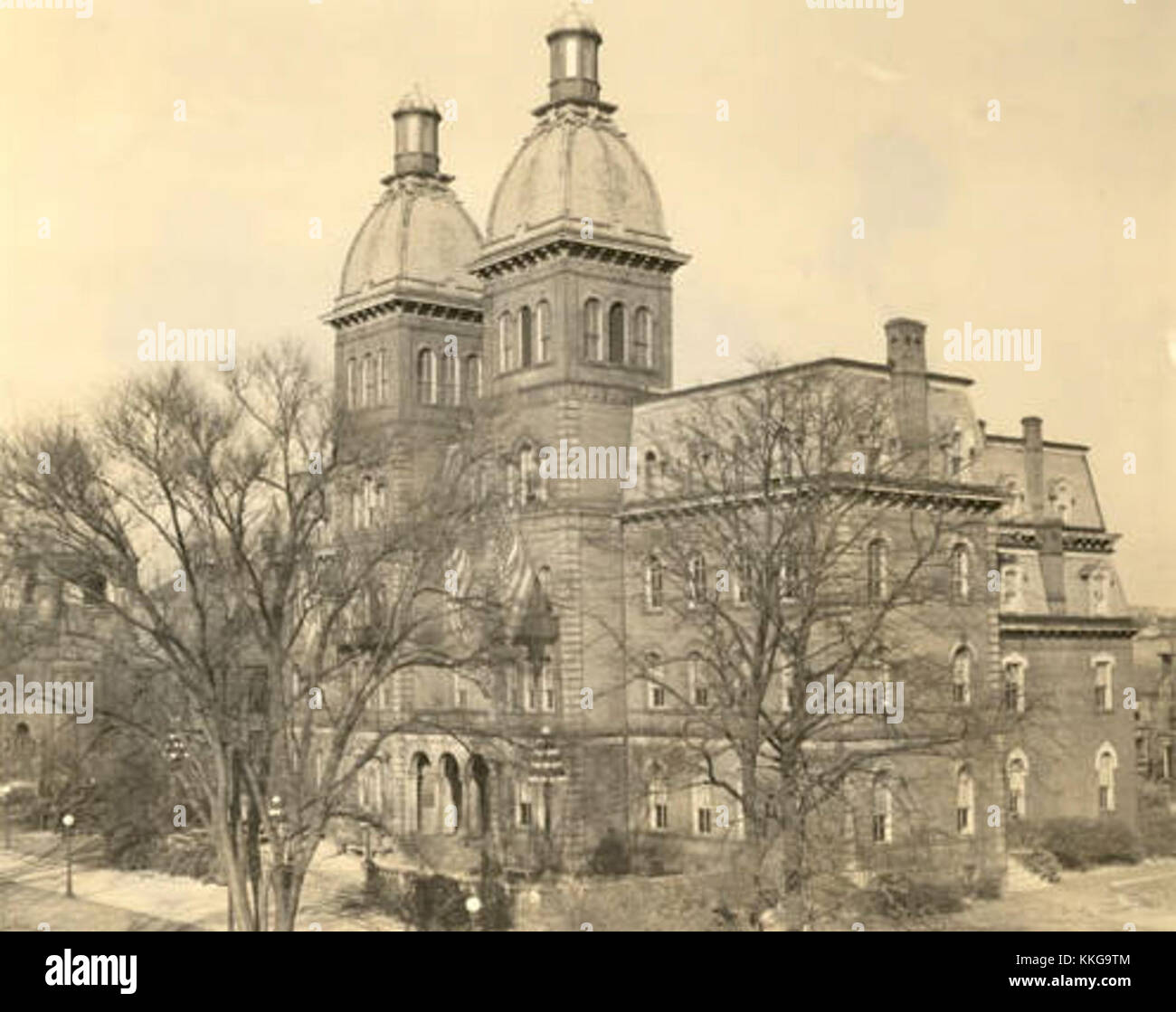 This historical photograph captures Old Main from the 1930s or 1940s ...
