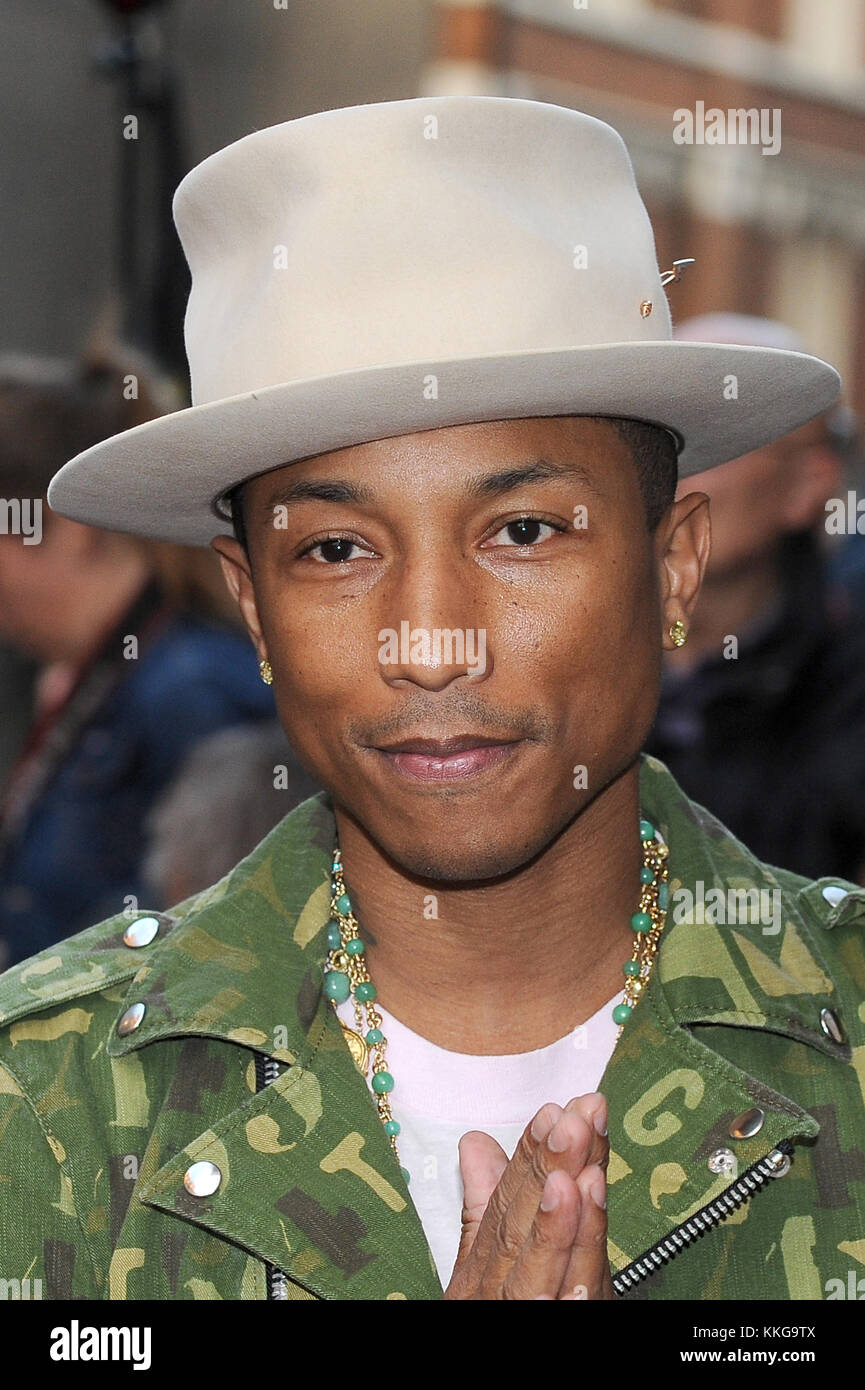 American singer Pharrell Williams attends the GQ Men of the Year Awards ...