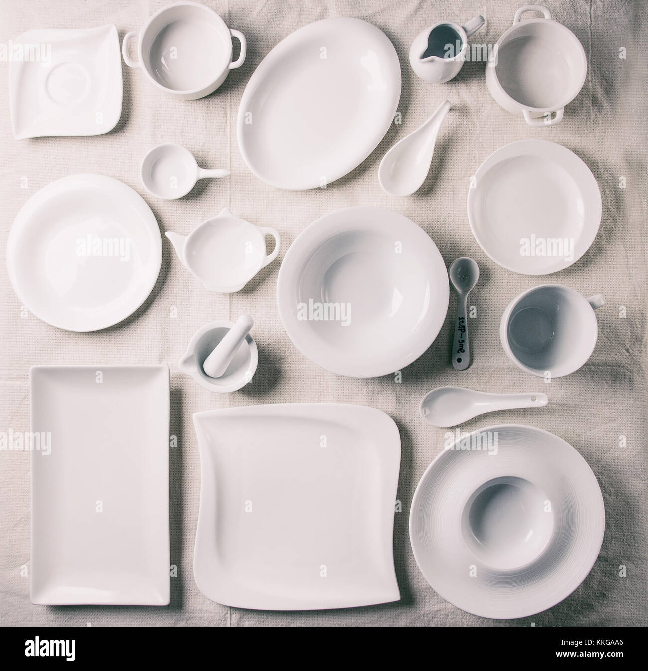 Set of white plates Stock Photo - Alamy