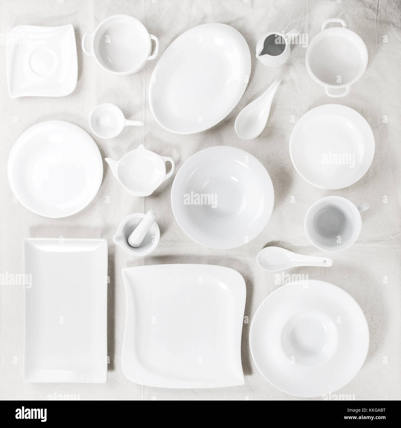Set of white plates Stock Photo - Alamy