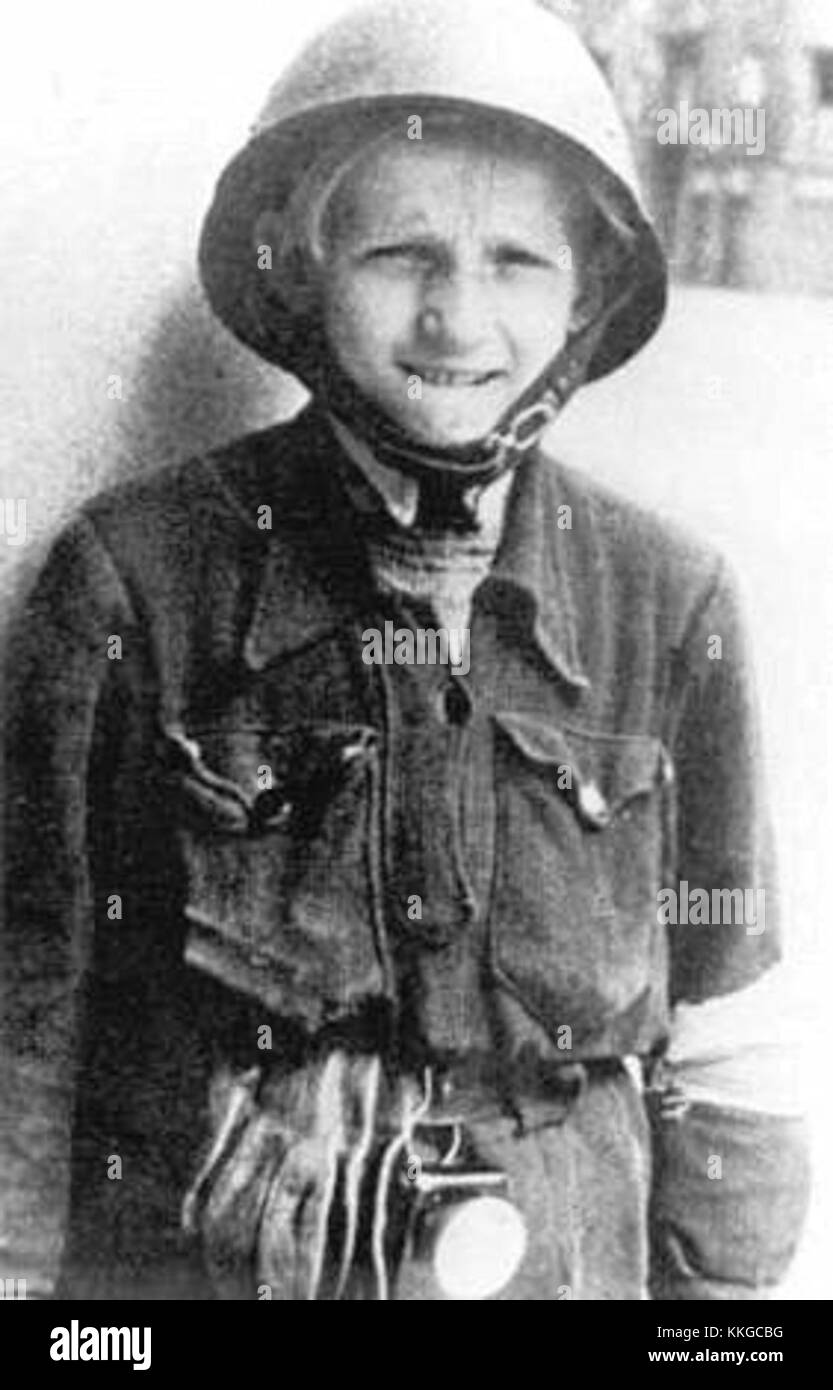 This artwork depicts a young soldier during the Warsaw Uprising, an ...