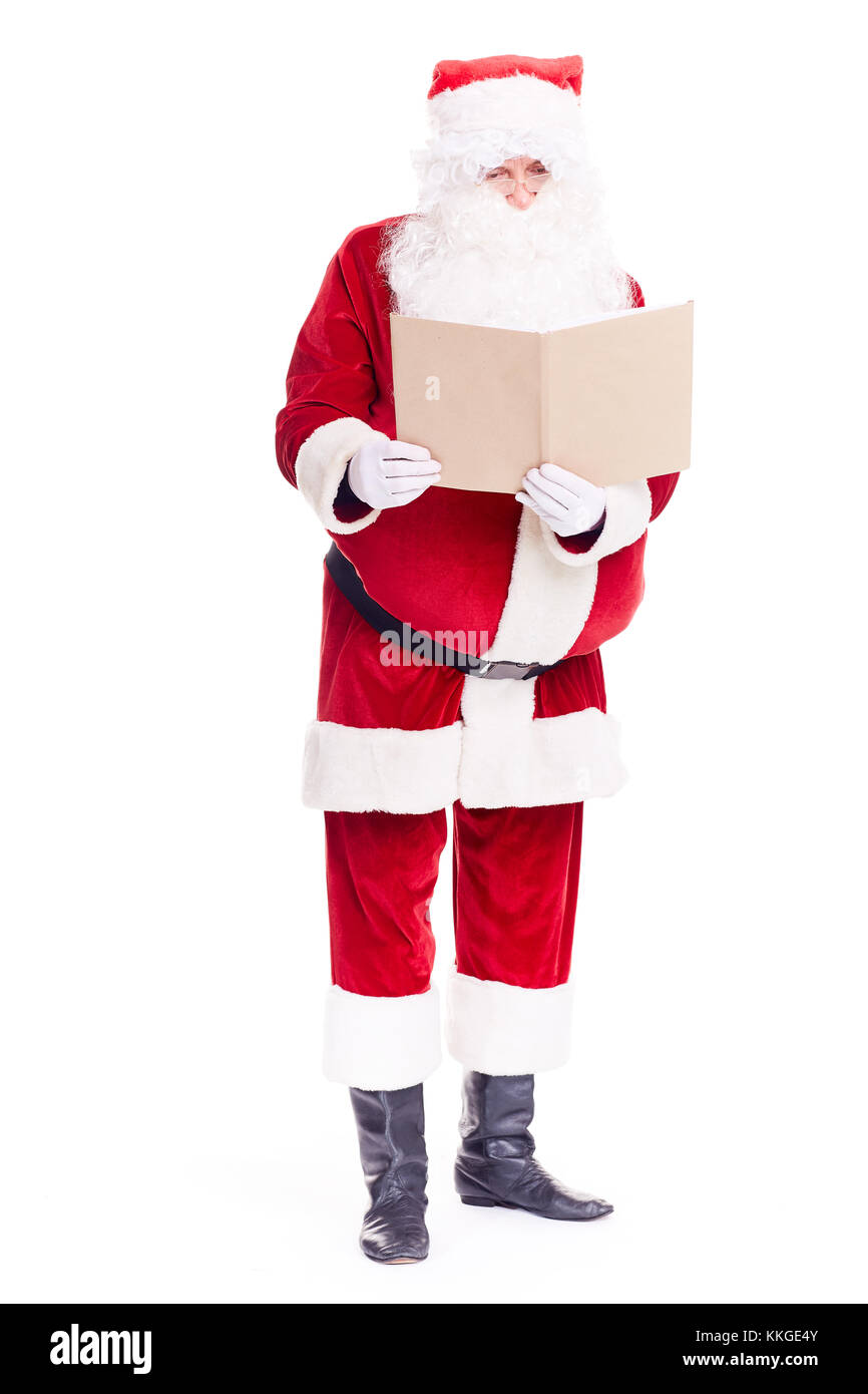 Santa Claus with book Stock Photo - Alamy