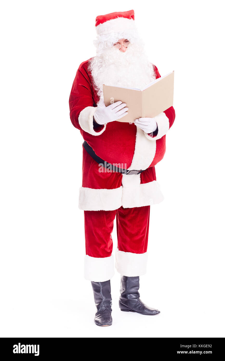 Santa Claus with book Stock Photo - Alamy