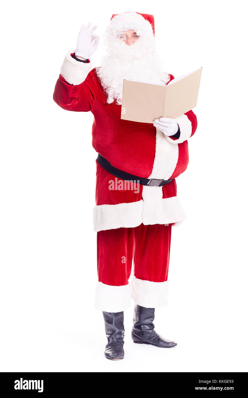 Santa Claus with book Stock Photo - Alamy
