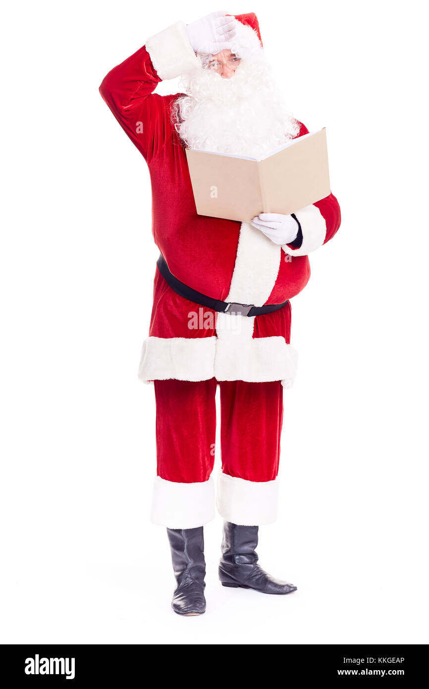 Santa Claus with book Stock Photo - Alamy