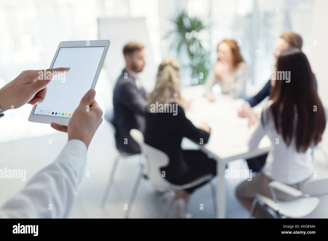 Close-up picture of businessman holding digital tablet Stock Photo - Alamy