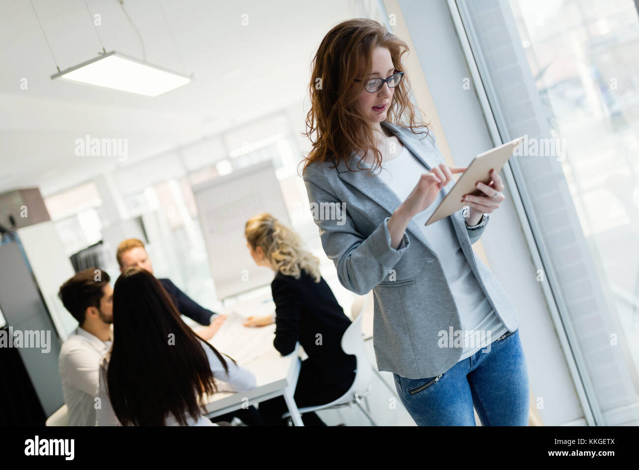 Young female architect using digital tablet in office Stock Photo - Alamy Young female architect using digital tablet in office Stock Photo - Alamy