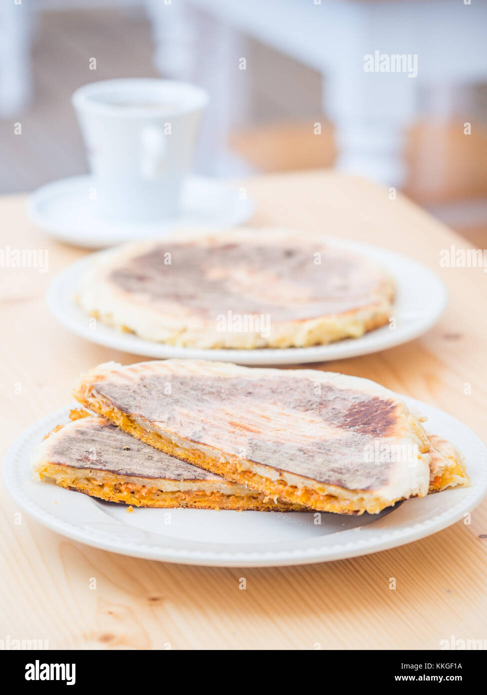 Bolo levedo, typical bread from Vale das Furnas in Azores, grilled with ...